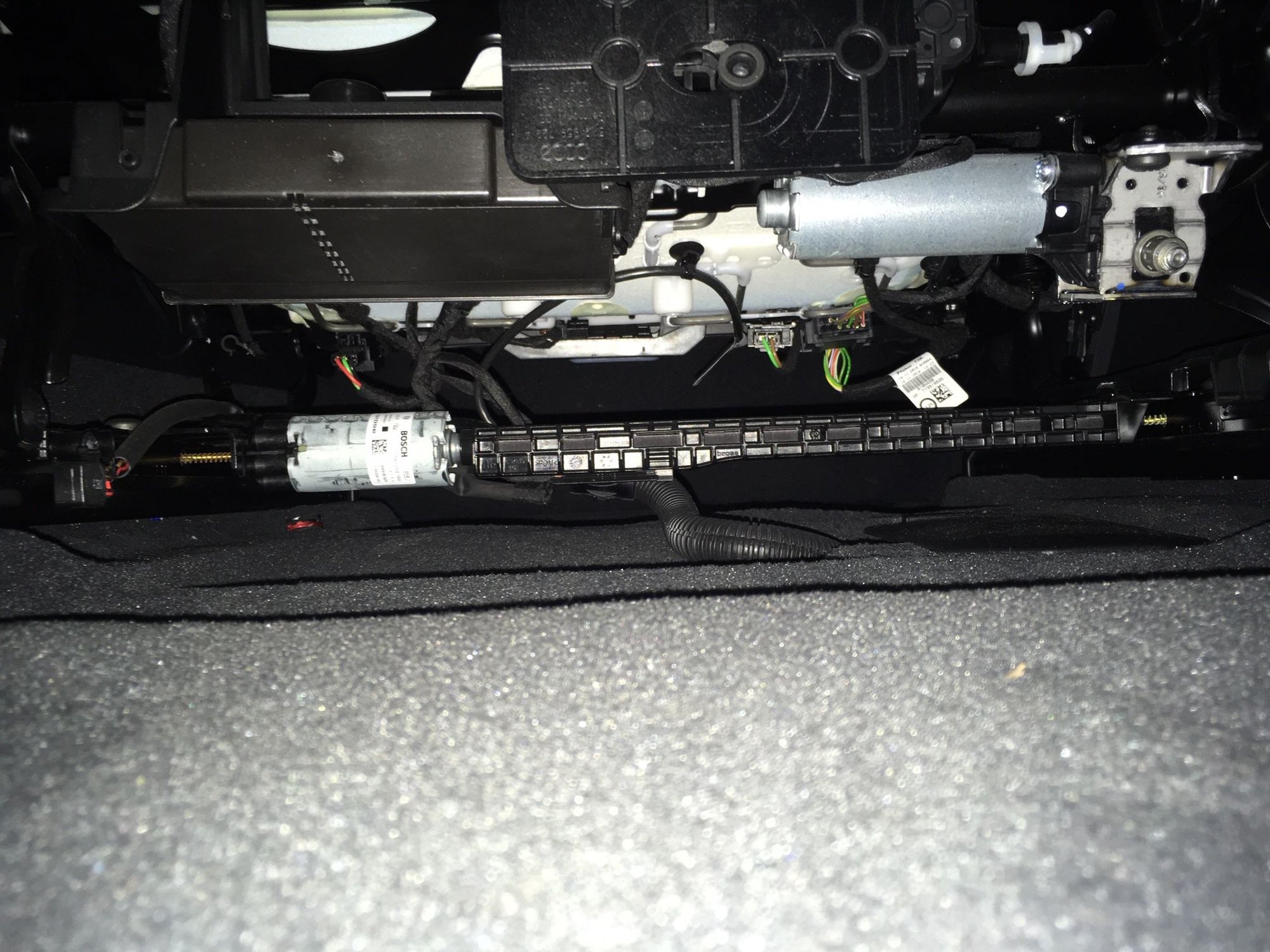 Loose module under driver seat - AudiWorld Forums