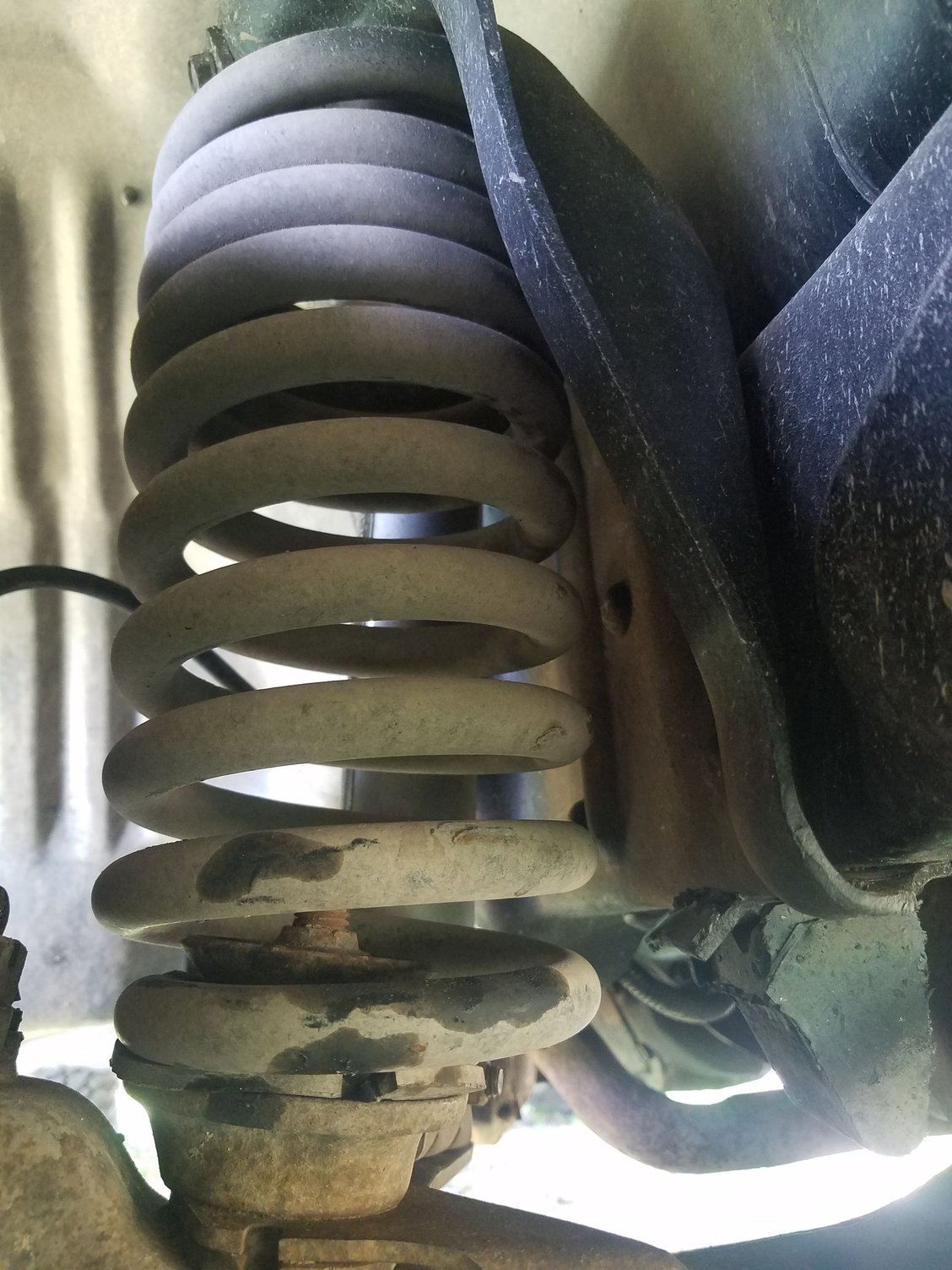 Coil spring isolator - Ford Truck Enthusiasts Forums