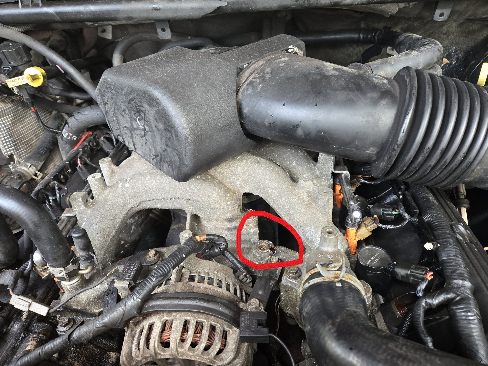Hole in intake manifold - Ford Truck Enthusiasts Forums